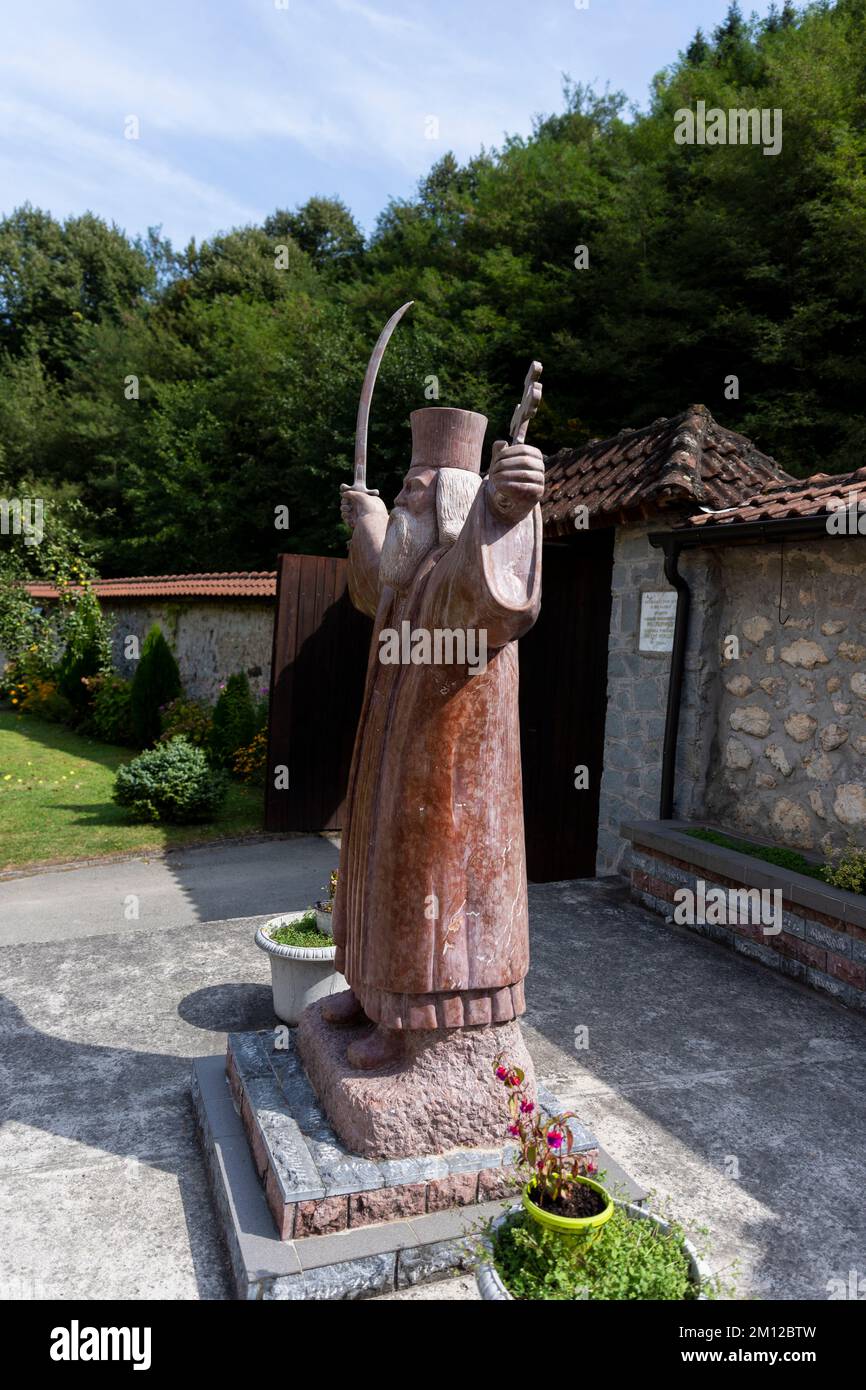 Monument of Hadzi Milentije at medieval monastery Raca at Tara mountain ...