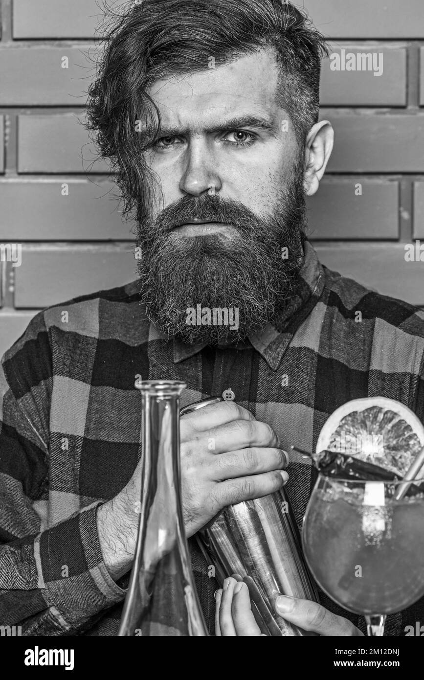 Bartending concept. Barman with long beard and mustache and stylish ...