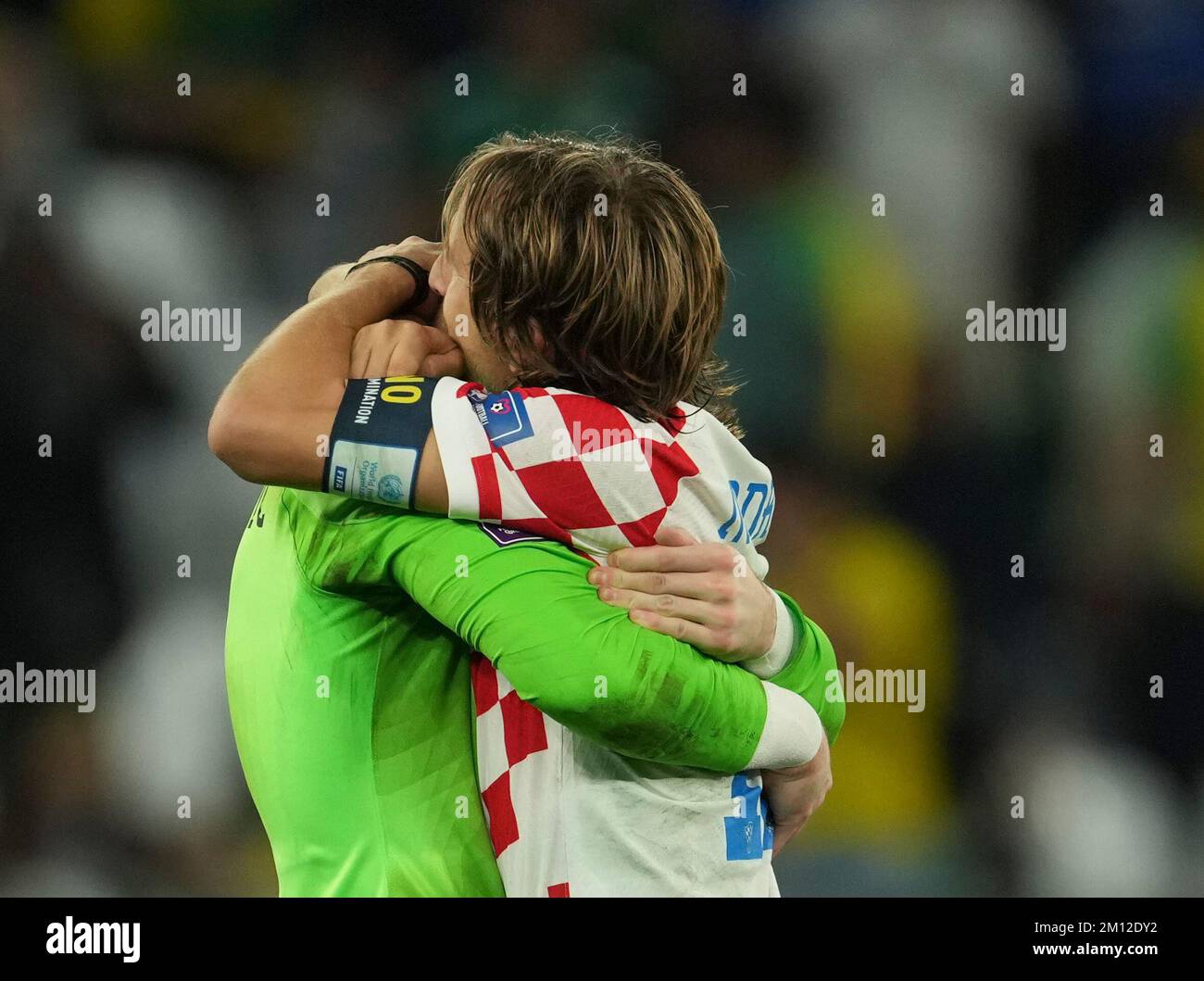 Al Rayyan, Qatar. 9th Dec, 2022. Luka Modric (R) of Croatia celebrates ...