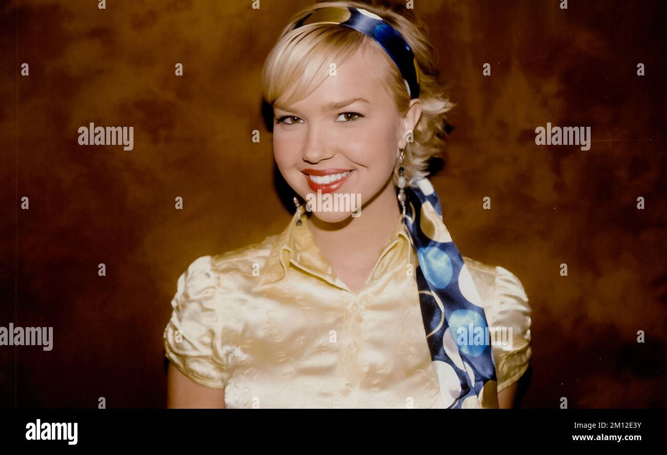 Retro celebrity portraits - Arielle Kebbel, at a press conference event ...