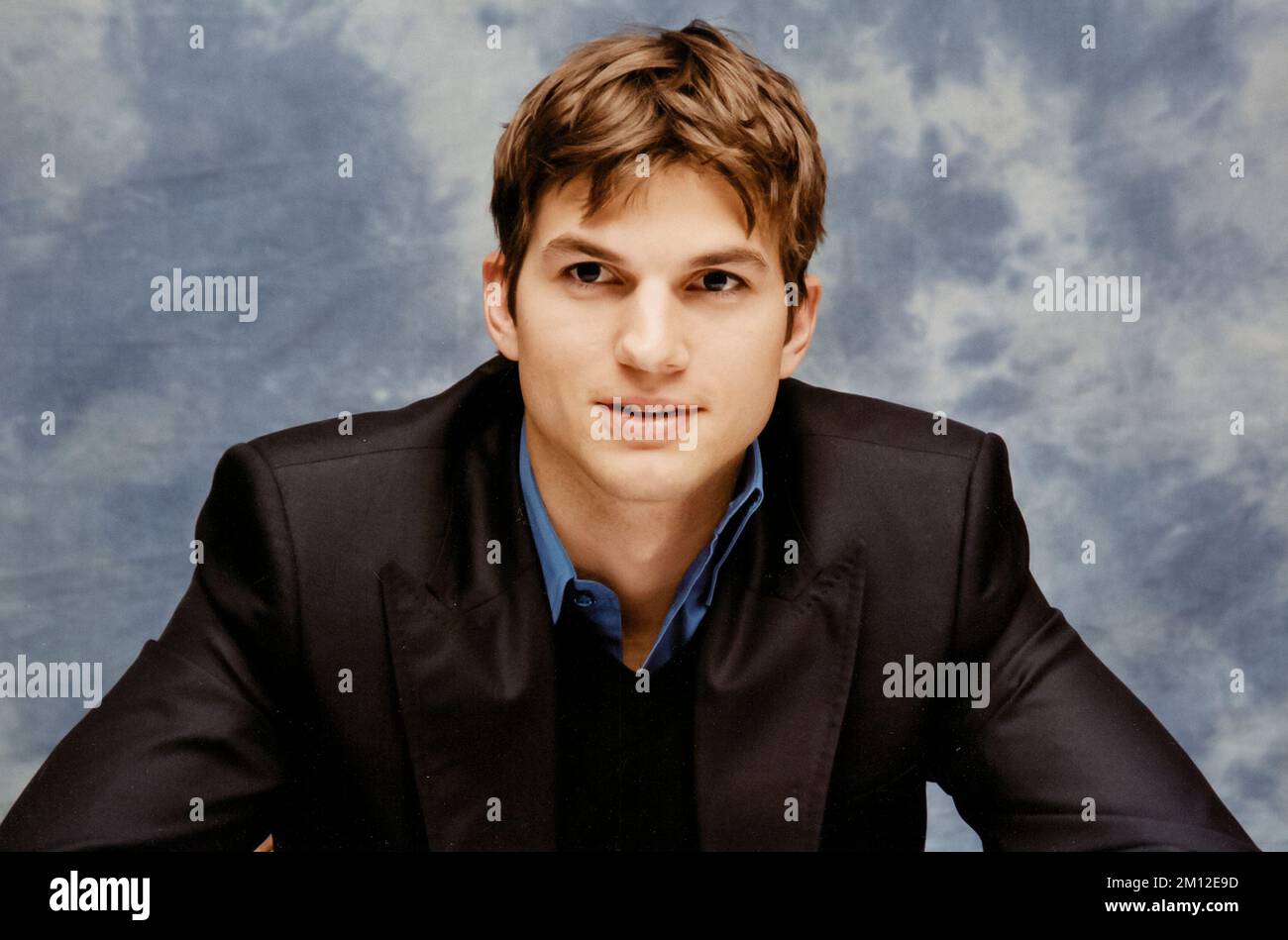 Retro celebrity portraits - Ashton Kutcher, at a press conference event ...