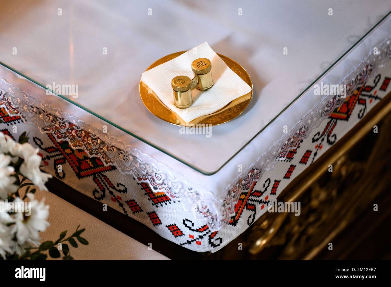 Chrysanthemum and jar for peace oil, Sacrament of Baptism of a person ...