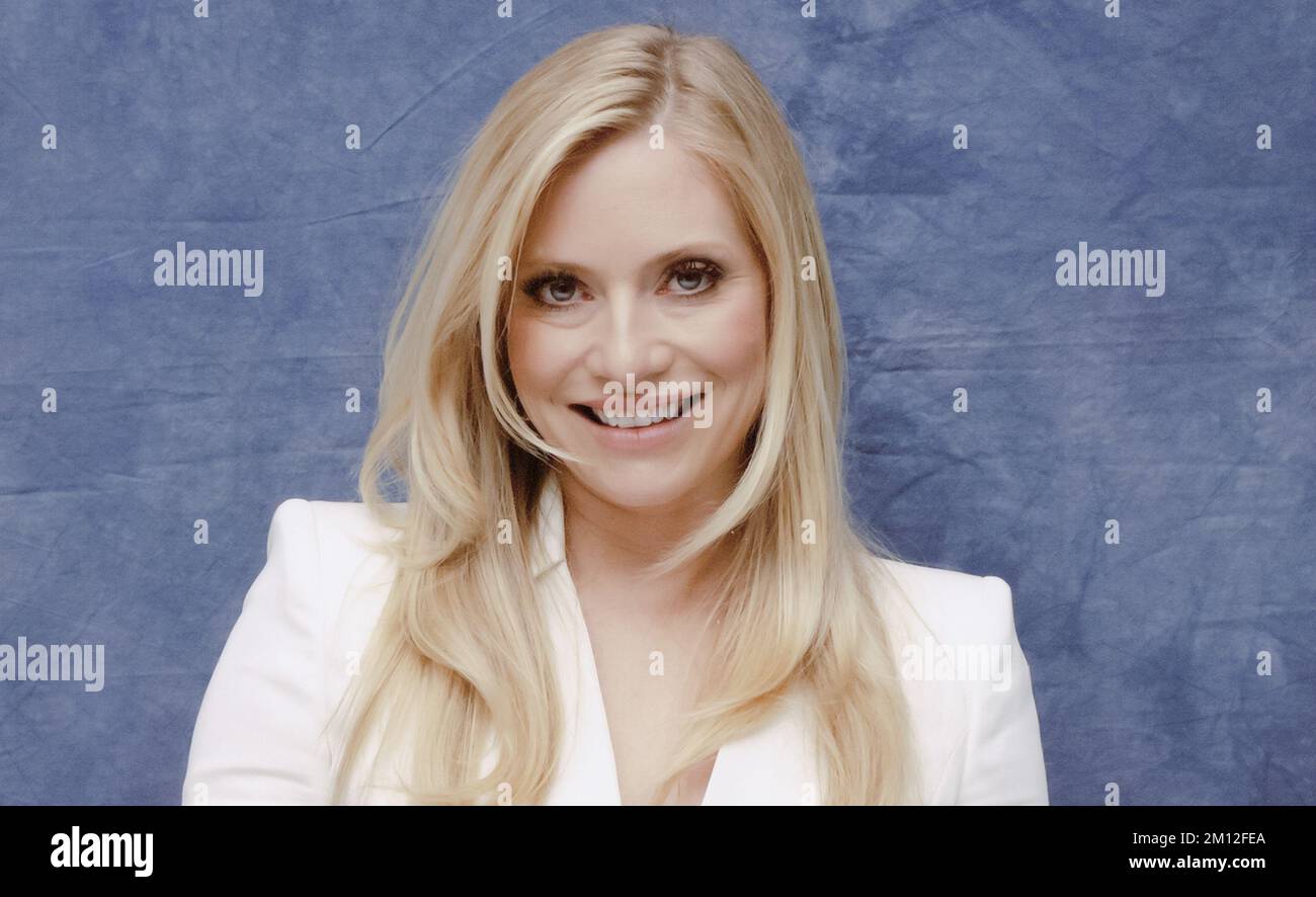 Retro celebrity portraits - Emily Procter, at a press conference event ...
