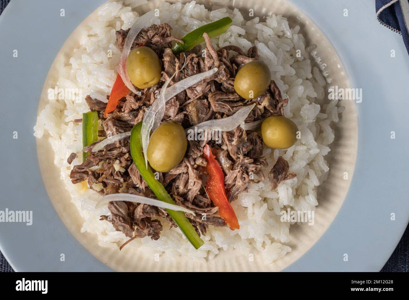Top view of Shredded meat with rice, typical Cuban food Stock Photo - Alamy