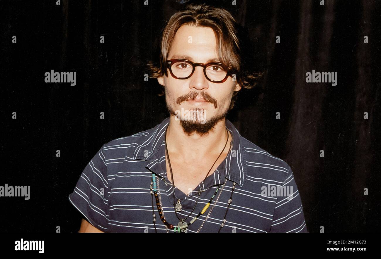 Retro celebrity portraits - Johnny Depp, at a press conference event ...