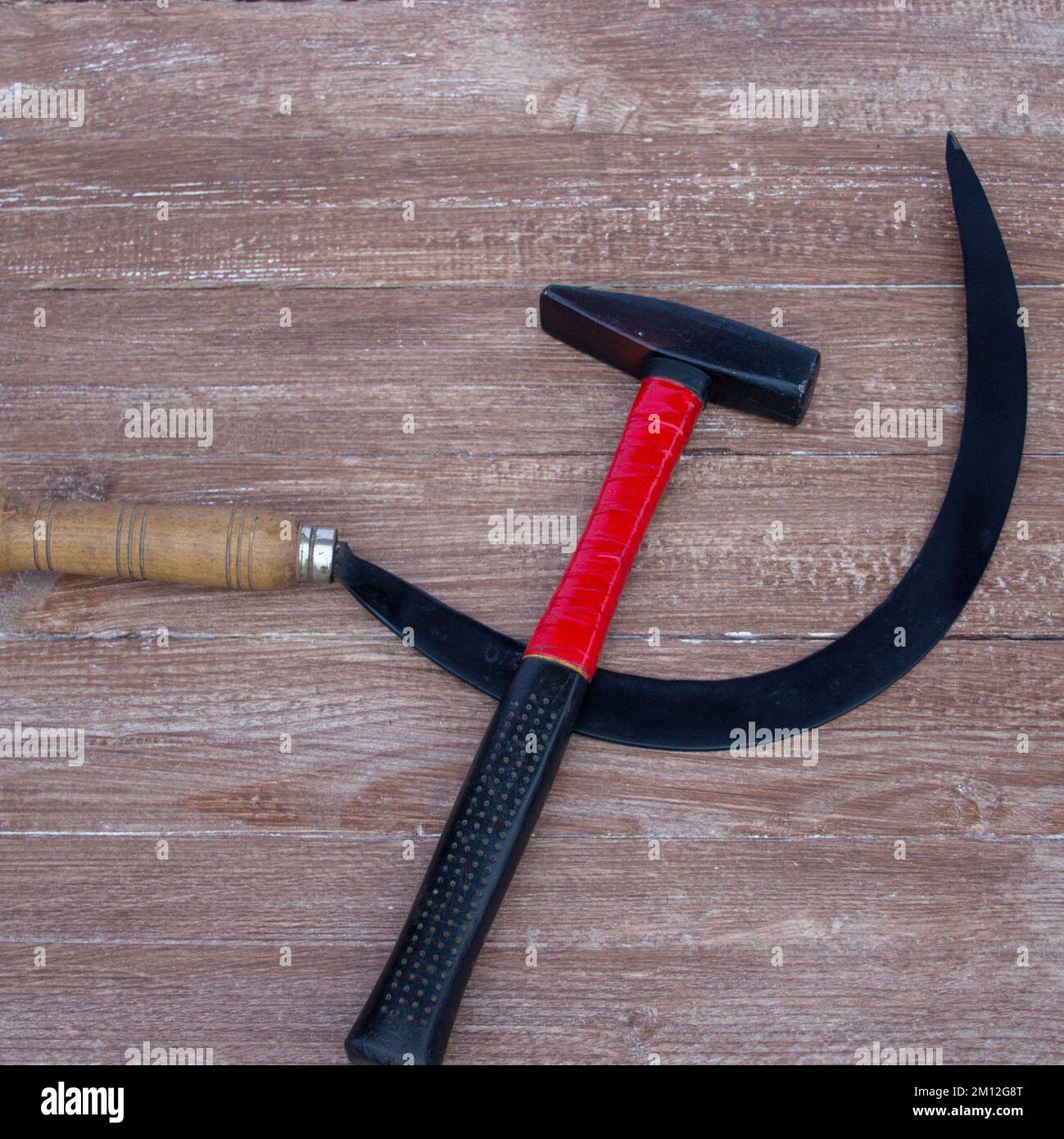 Image of a hammer and sickle on wooden background. World symbol Stock ...