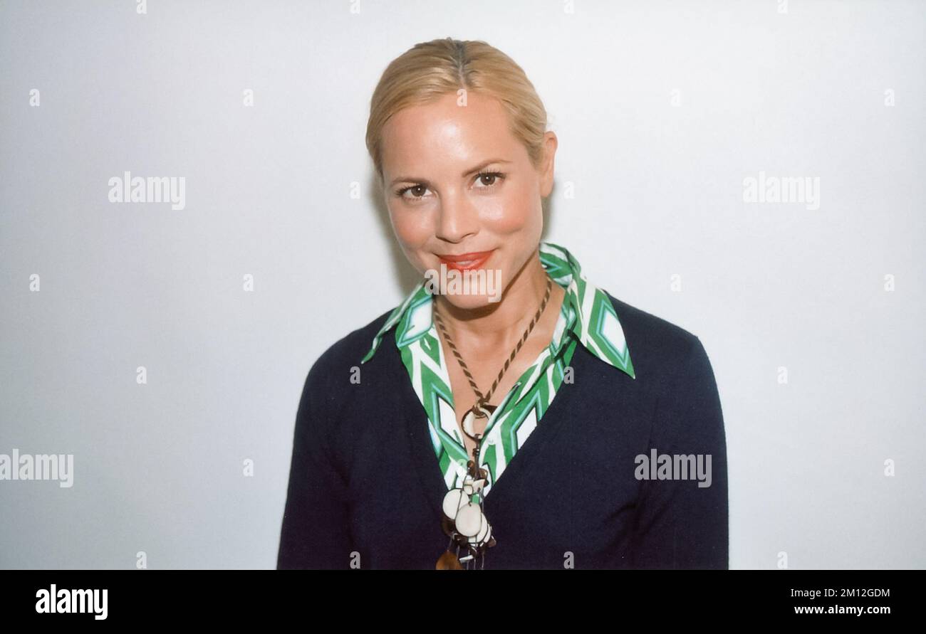 Retro celebrity portraits - Maria Bello, at a press conference event ...