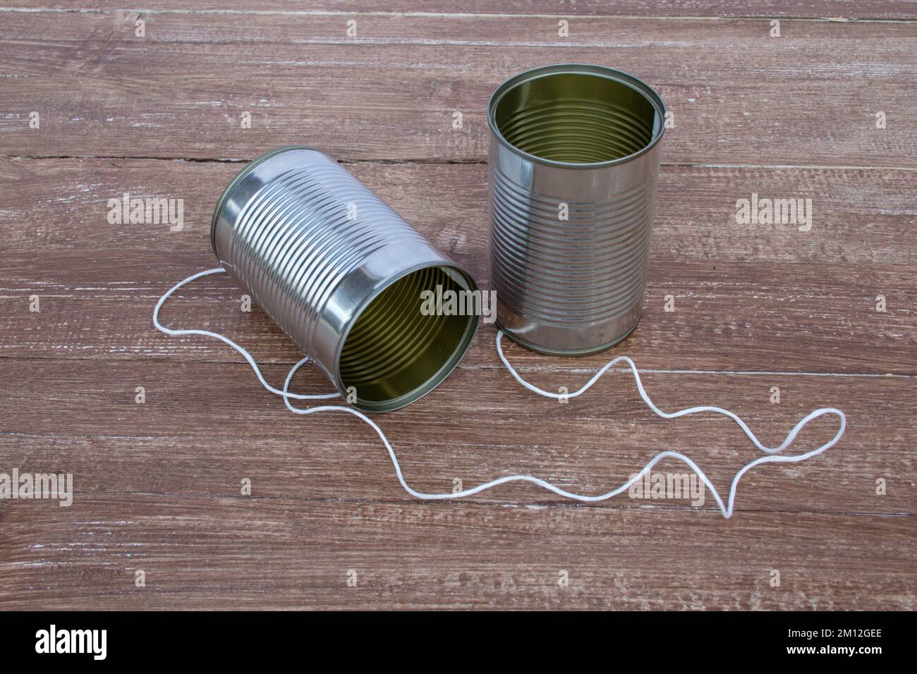 Image of two jars tied with string. Game for children to talk remotely ...