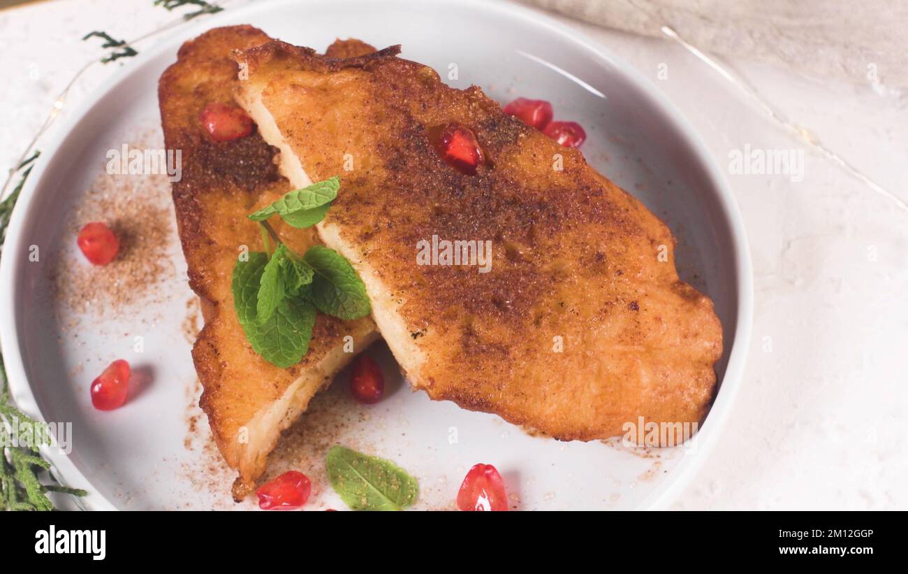 Traditional Christmas Rabanadas with pommegranate seeds, pine nuts and ...