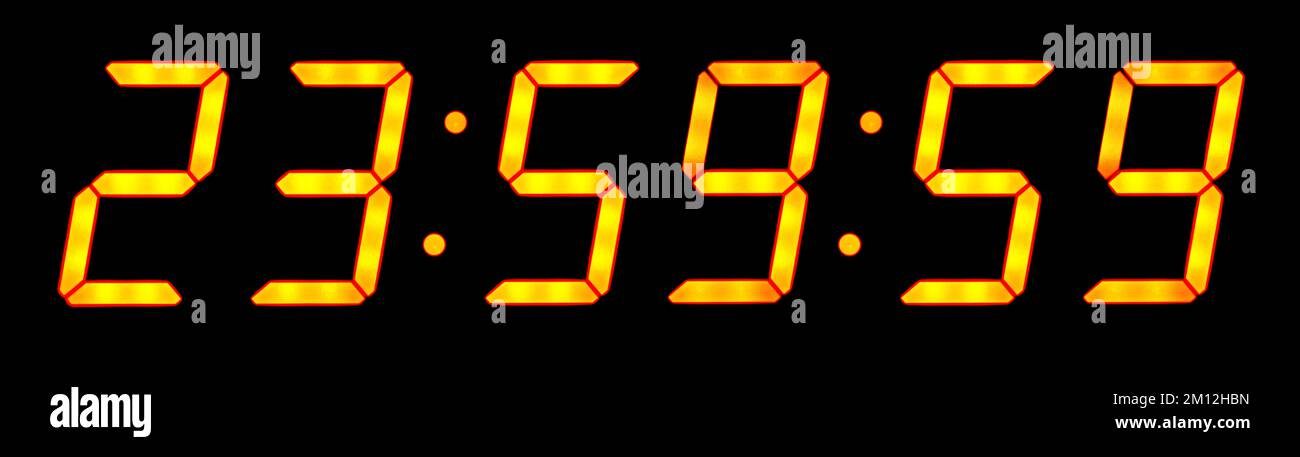 Digital electronic clock shows 23:59:59 on the eve of the New Year ...
