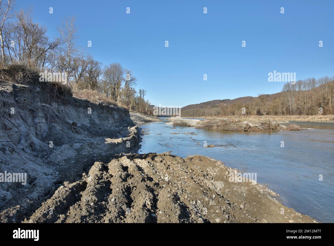 Worn river bank and filled gravel bank, renaturation of the Salzach ...