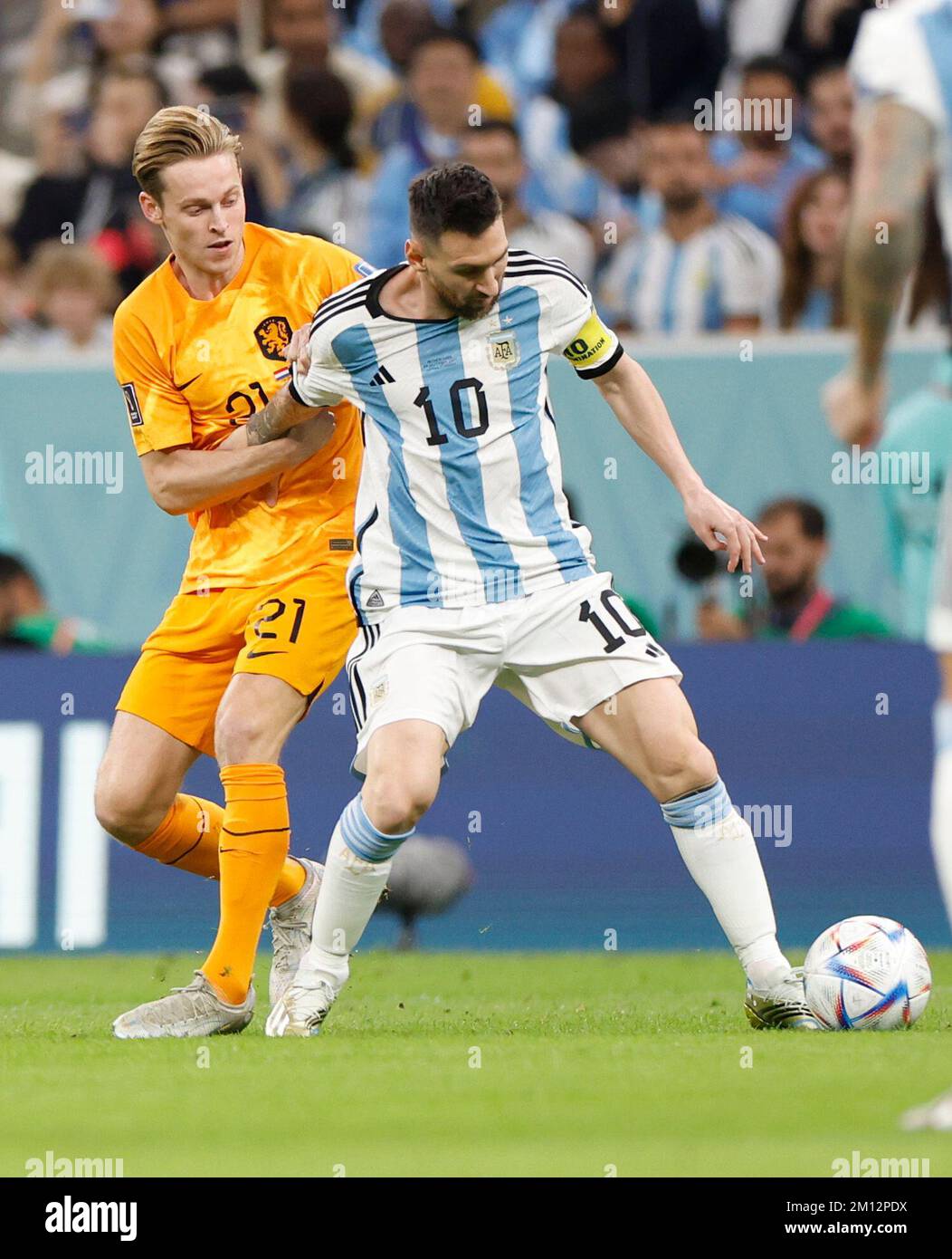 Lusail, Qatar. 9th Dec, 2022. Lionel Messi (R) of Argentina vies with ...