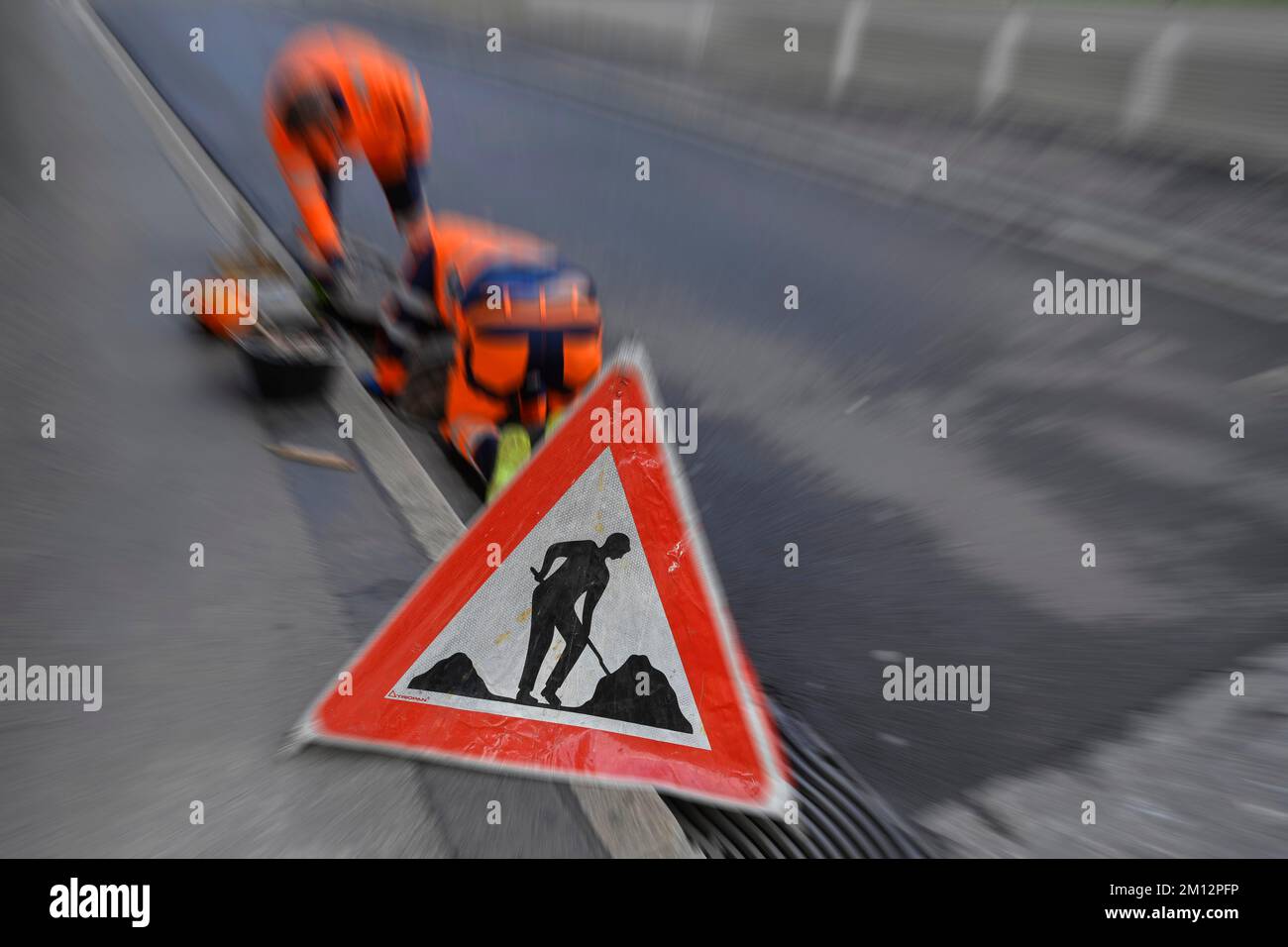 Panning construction site Attention sign Stock Photo - Alamy