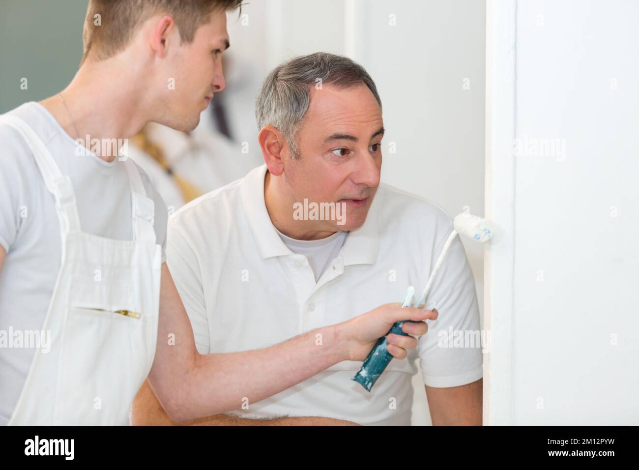 portrait of painter with apprentice Stock Photo - Alamy