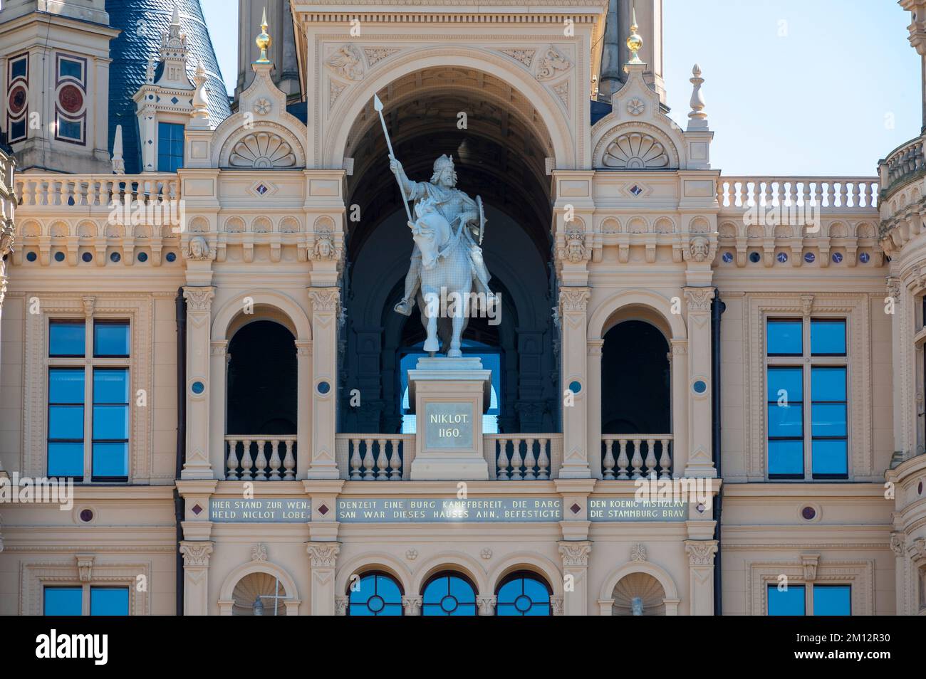 Castle facade with equestrian statue of fuerst niklot i hi-res stock ...
