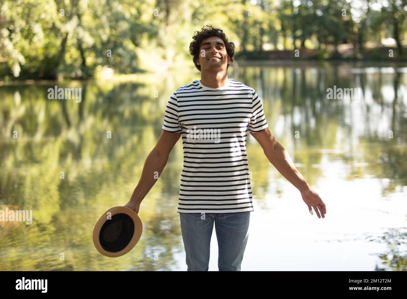 free man with open arms outdoors Stock Photo - Alamy