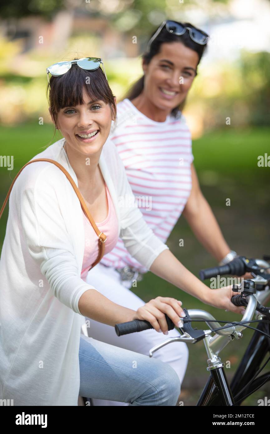 Two people conversation bicycle hi-res stock photography and images - Alamy
