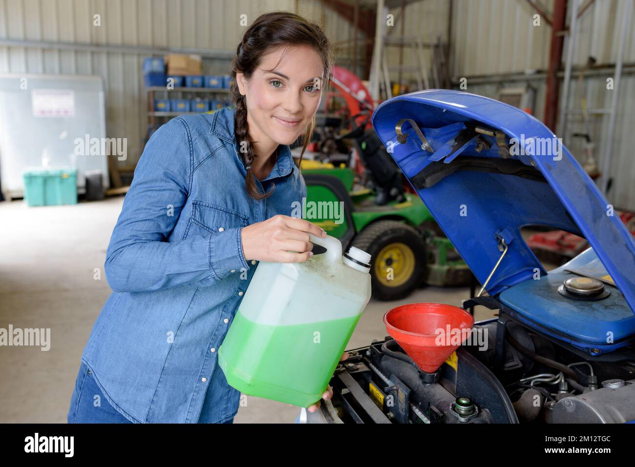 Pouring antifreeze coolant in radiator hi-res stock photography and ...