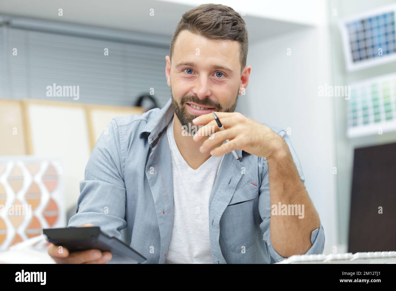 Man examining finances hi-res stock photography and images - Alamy