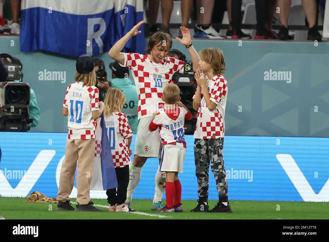AL RAYYAN, QATAR - DECEMBER 09: Luka Modric celebrating with children ...
