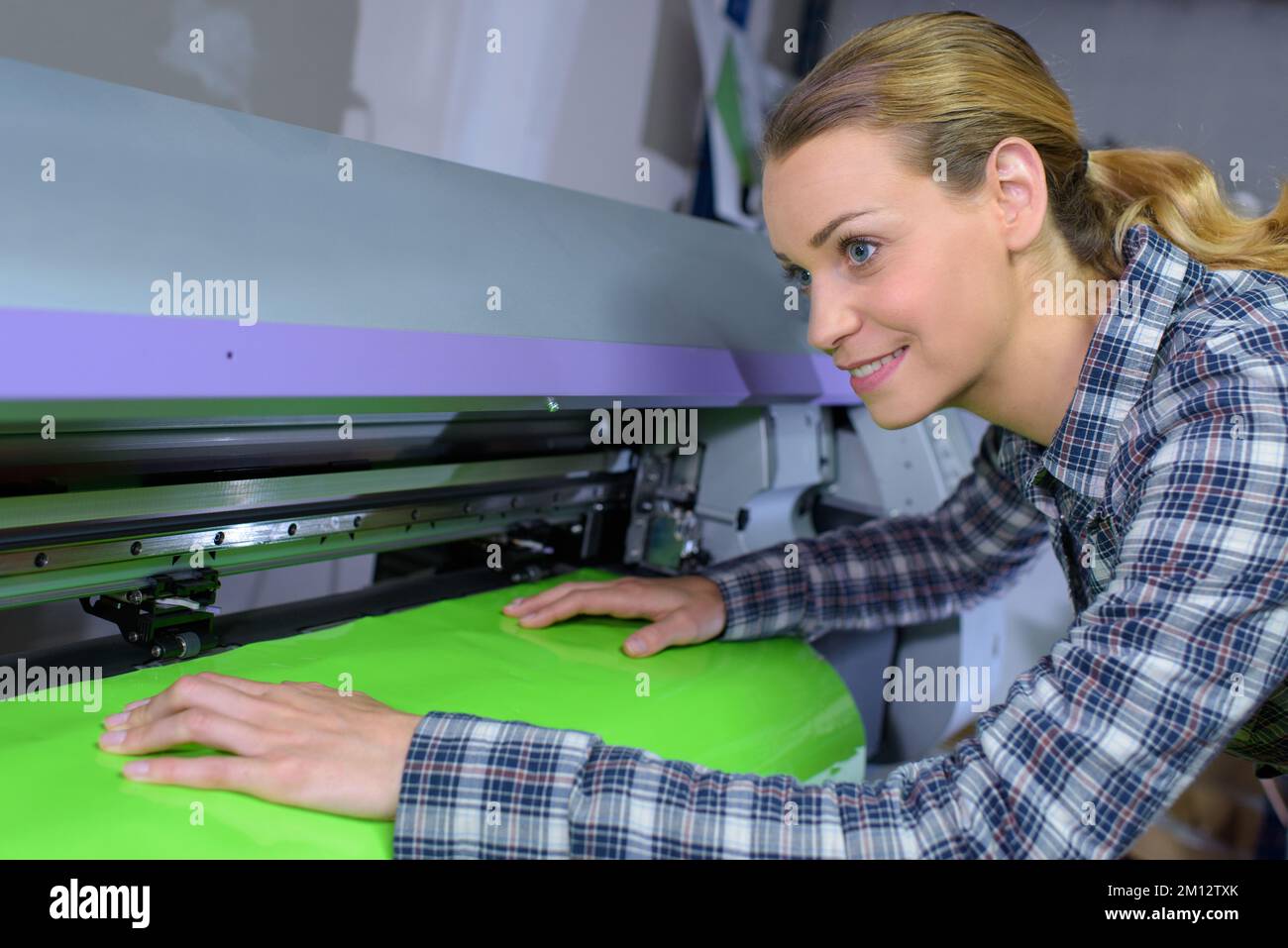 Woman working in printing hi-res stock photography and images - Alamy