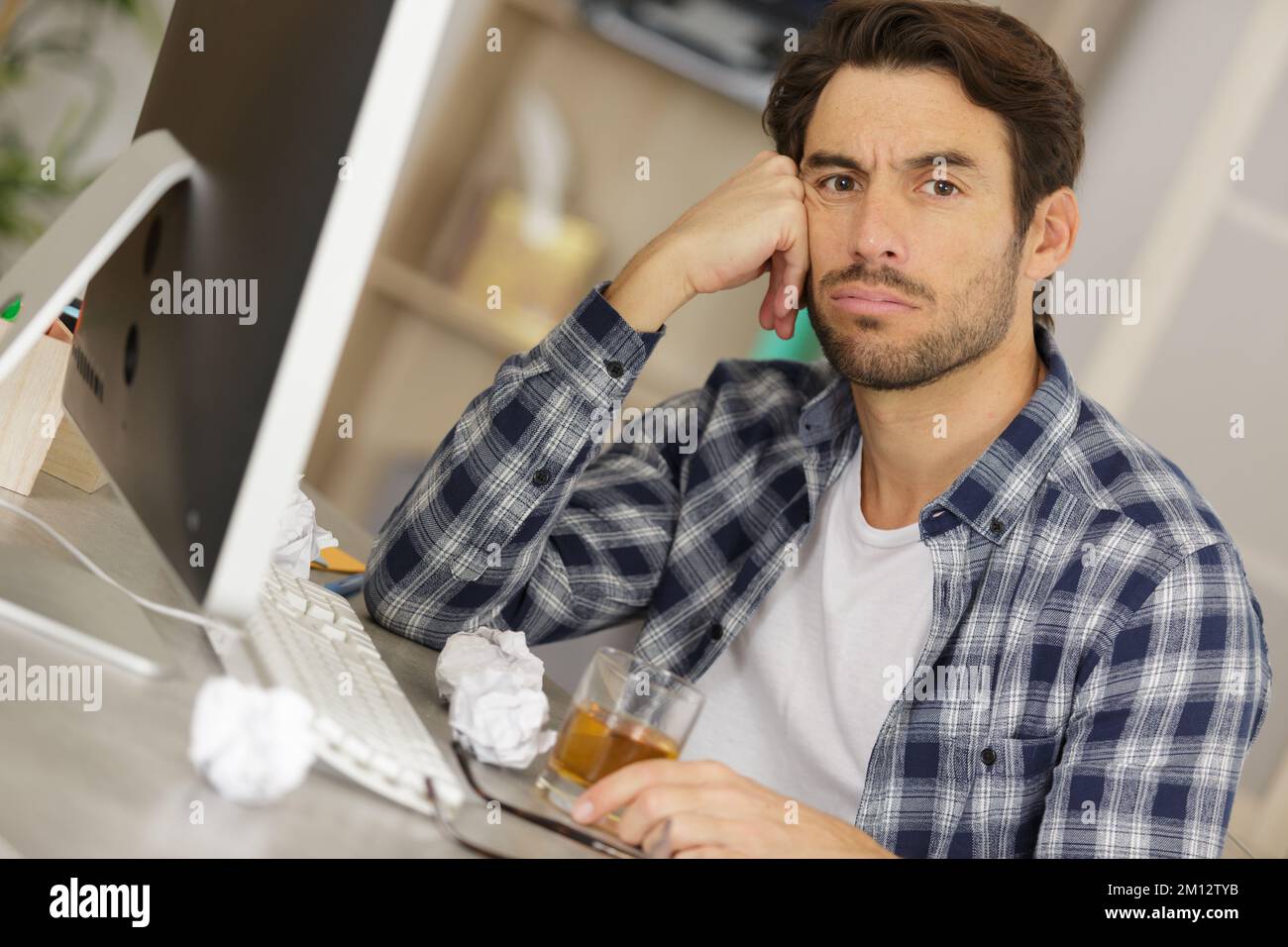 Tired businessman glass whiskey hi-res stock photography and images - Alamy