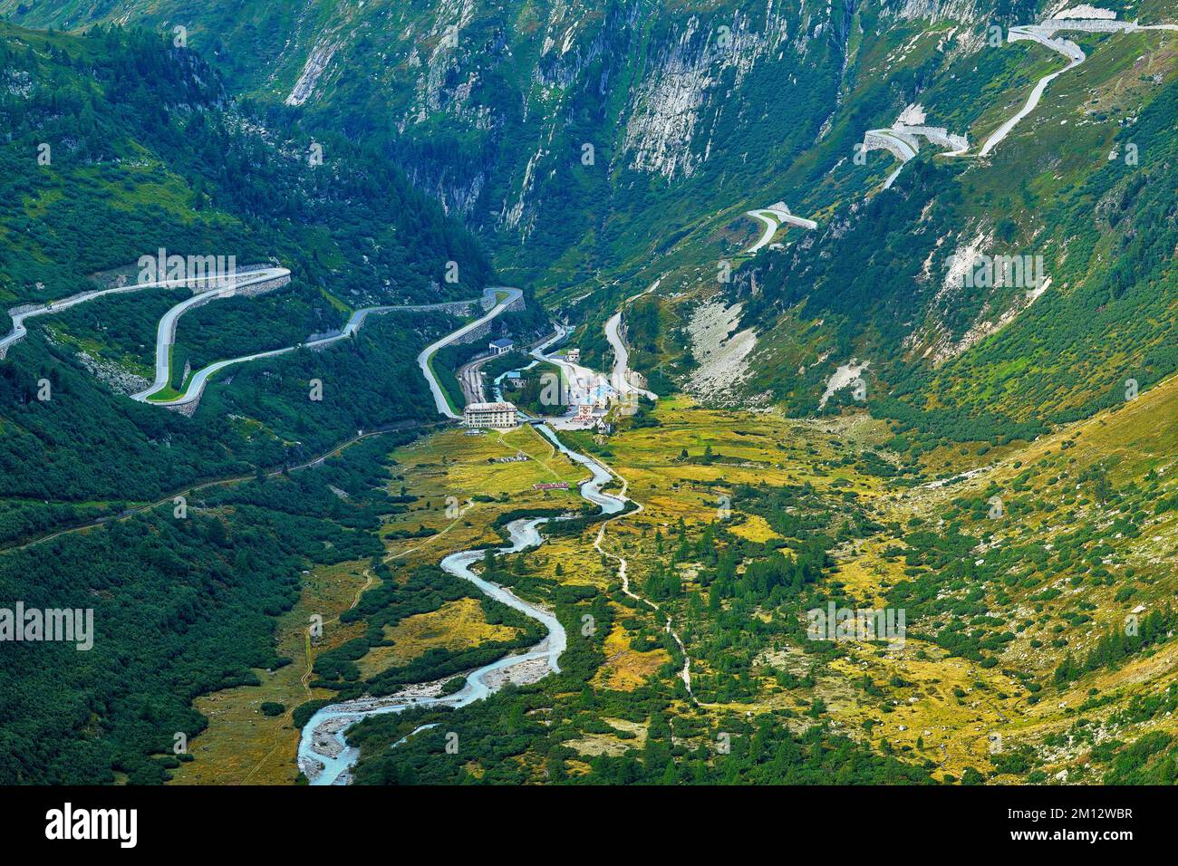 View from the Rhone glacier of the glacial stream and the pass roads ...
