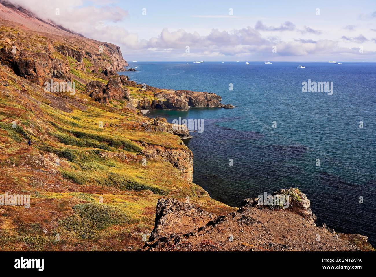 Basalt rock on the coast, Qeqertarsuaq, Disko Island, West Greenland ...