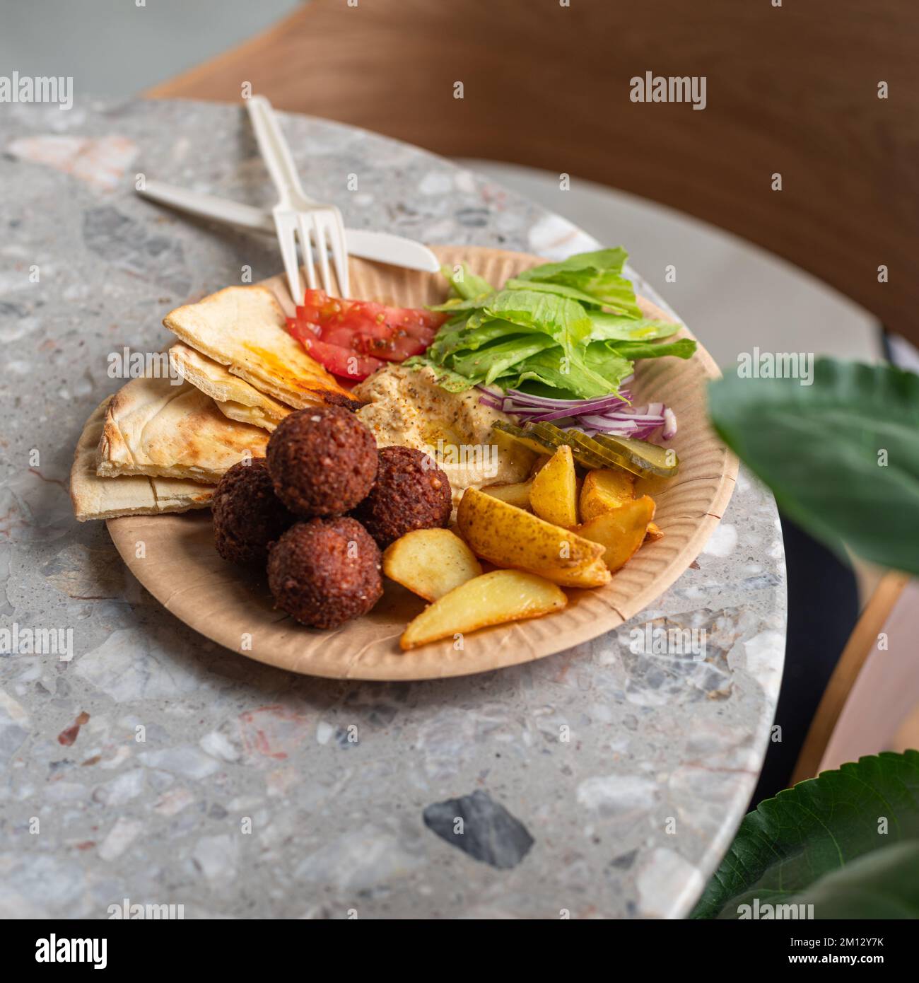 Large set of falafel, rustic potatoes, cheese sticks, chicken nuggets ...