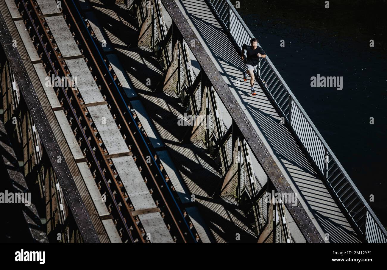 Man, Bridge, Jogging Stock Photo - Alamy