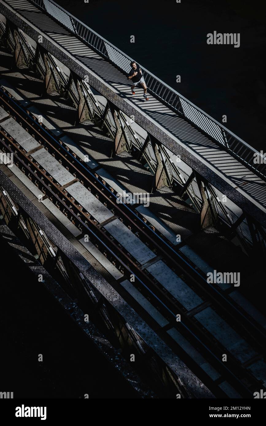 Man, Bridge, Jogging Stock Photo - Alamy