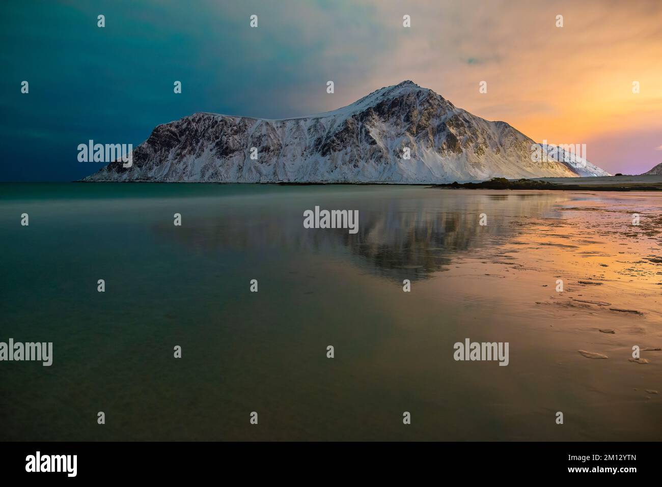 Night view from Skagsanden beach towards Vareid with reflection ...