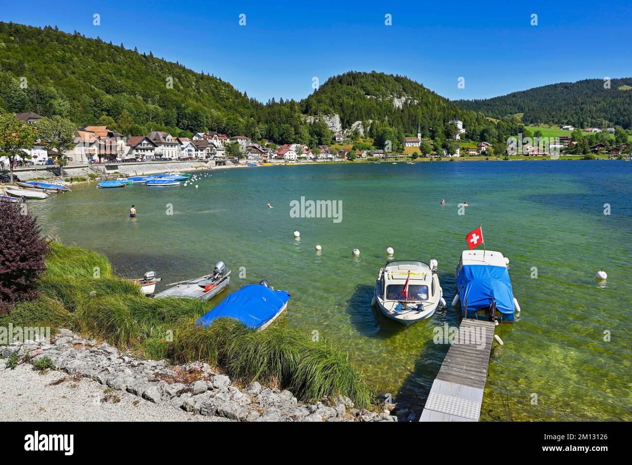 Boats on the shore of Lac de Joux, Le Pont, Canton Vaud, Switzerland ...