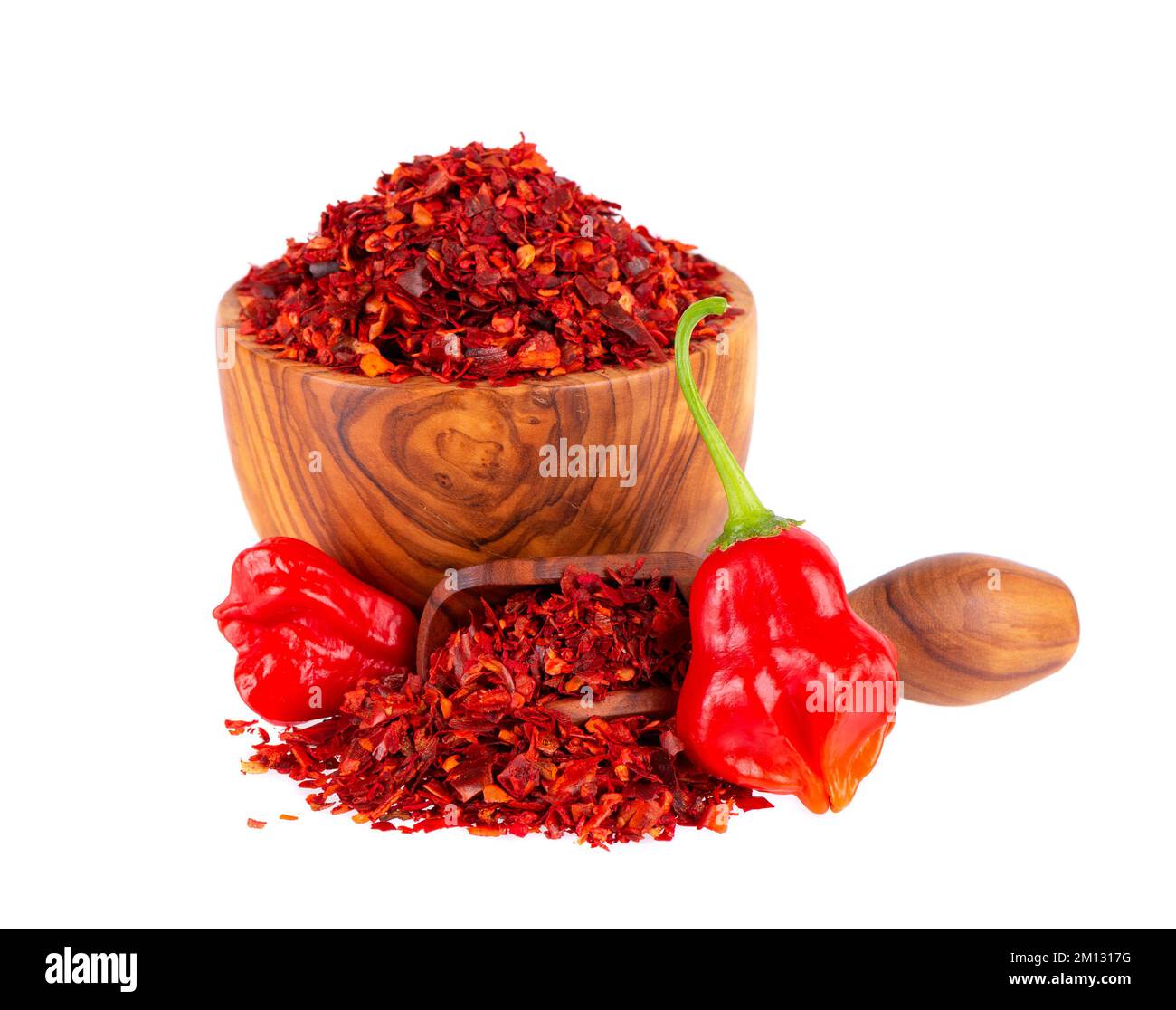 Fresh and dry ground red chili peppers isolated on white background ...