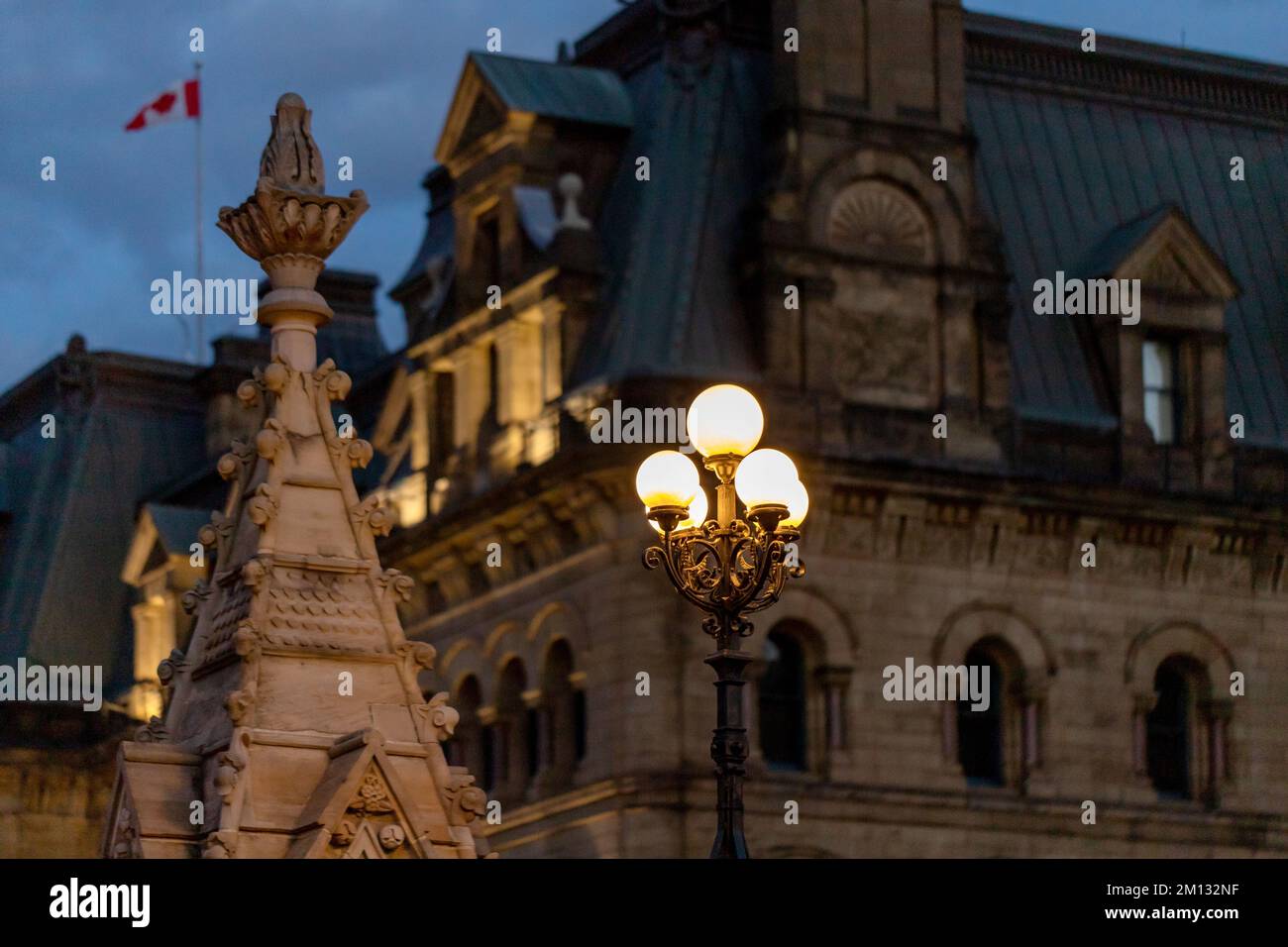 City view of downtown Ottawa, Canada at night with street lights and ...