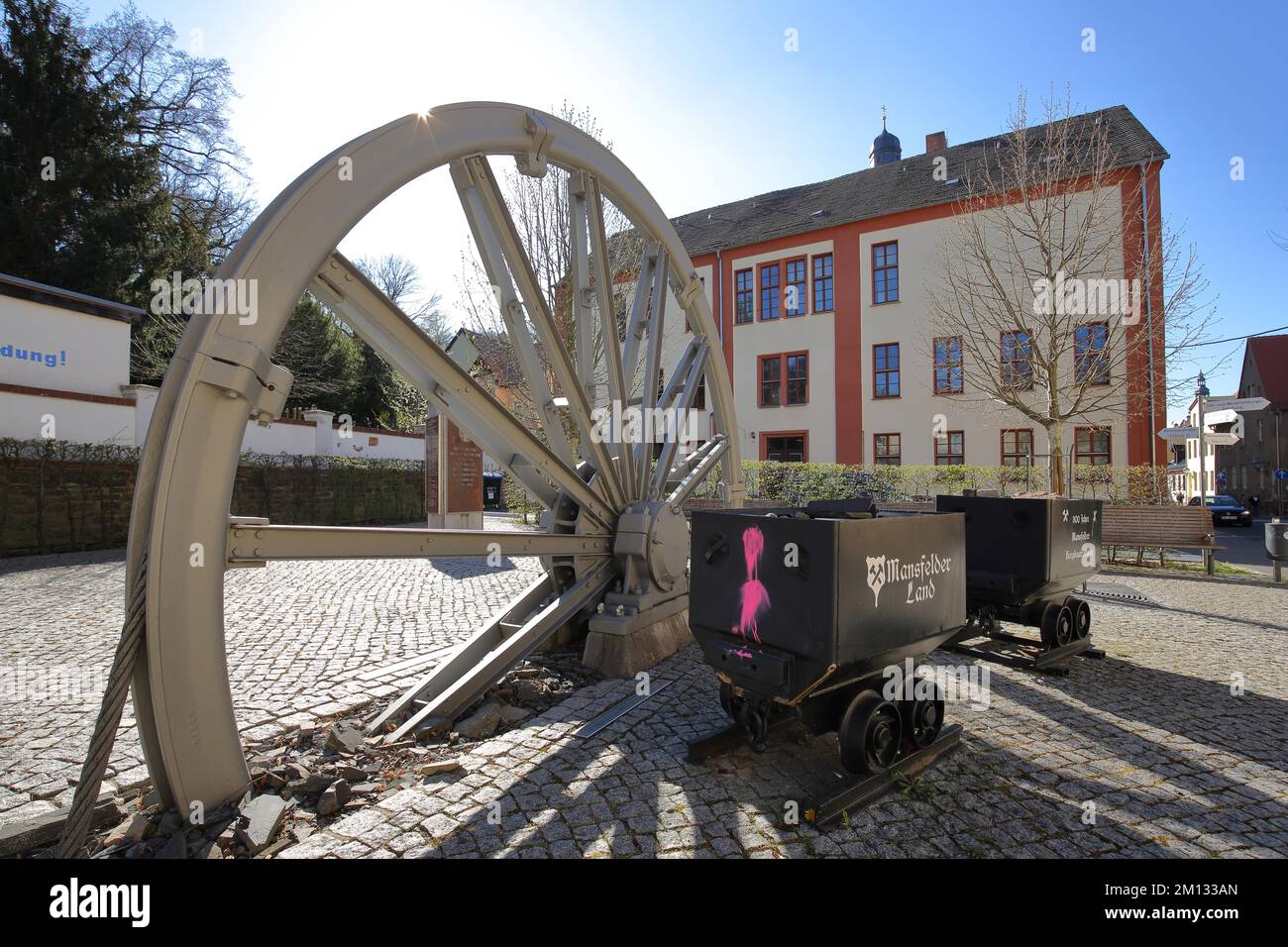 Monument with winding wheel and lorries at mining, lorry, Luther city ...
