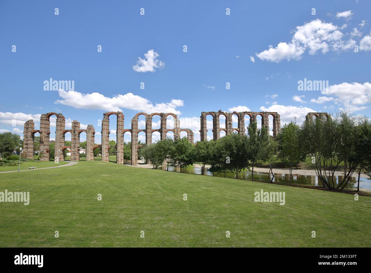 Roman aqueduct Acueducto de los Milagros over the Rio Albarregas, Forum ...