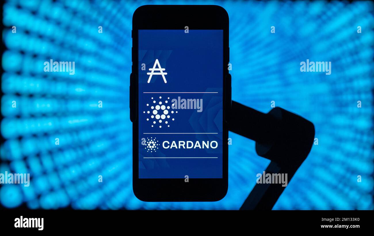 In this photo illustration, the logo of Cardano (ADA) is seen displayed ...