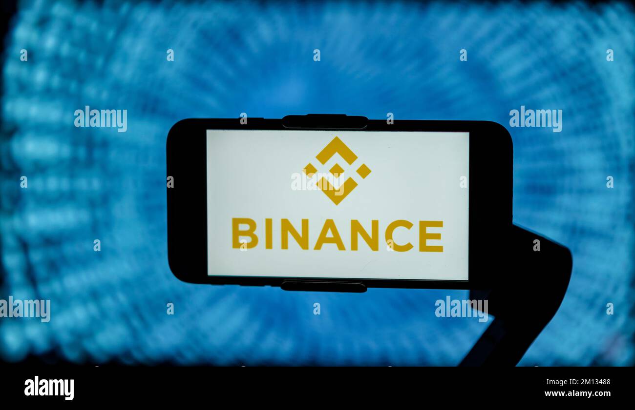 In this photo illustration, the logo of Binance is seen displayed on a ...