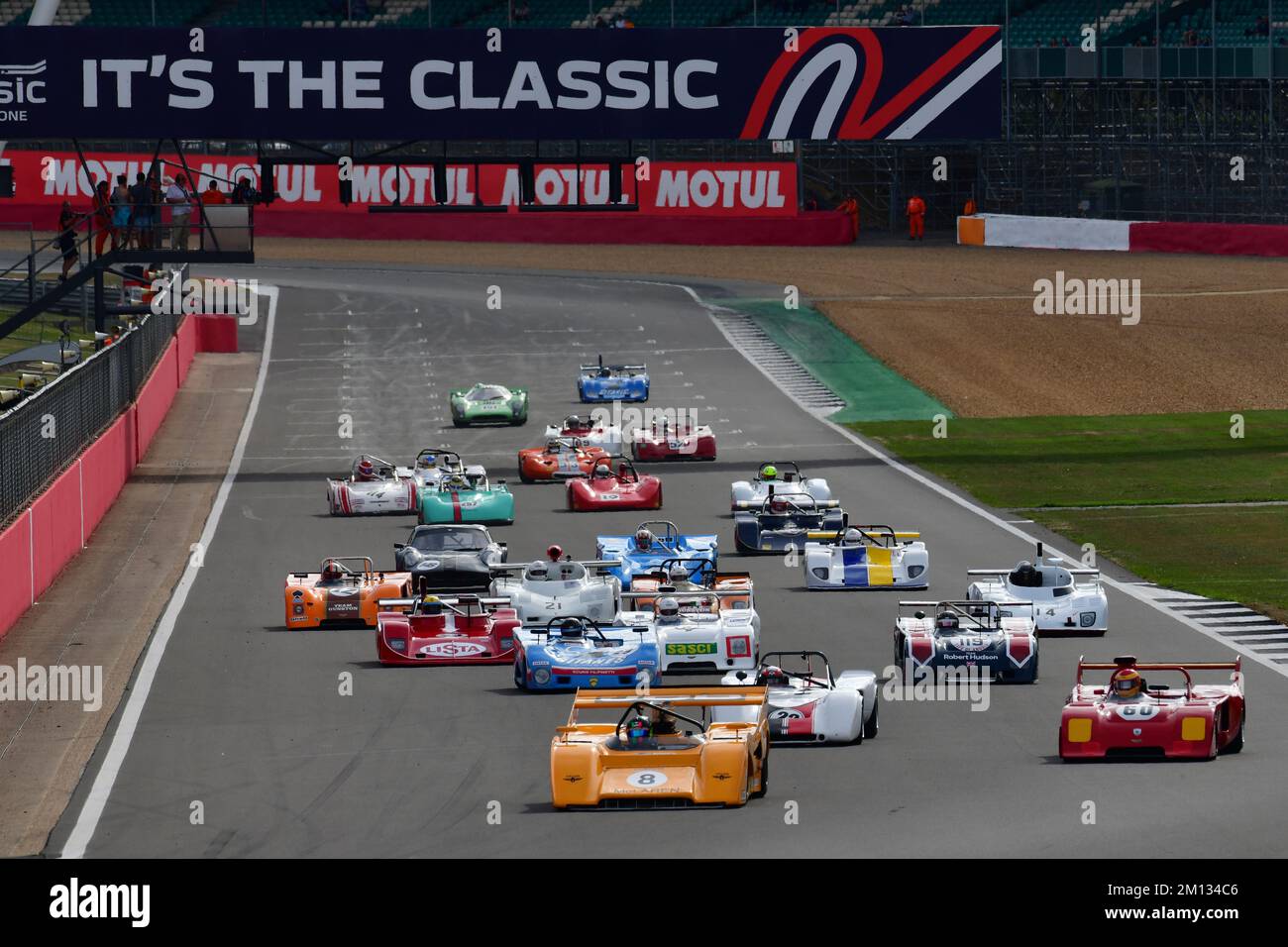 Dean Forward, McLaren M8F, leads th pack from pole position, HSCC ...