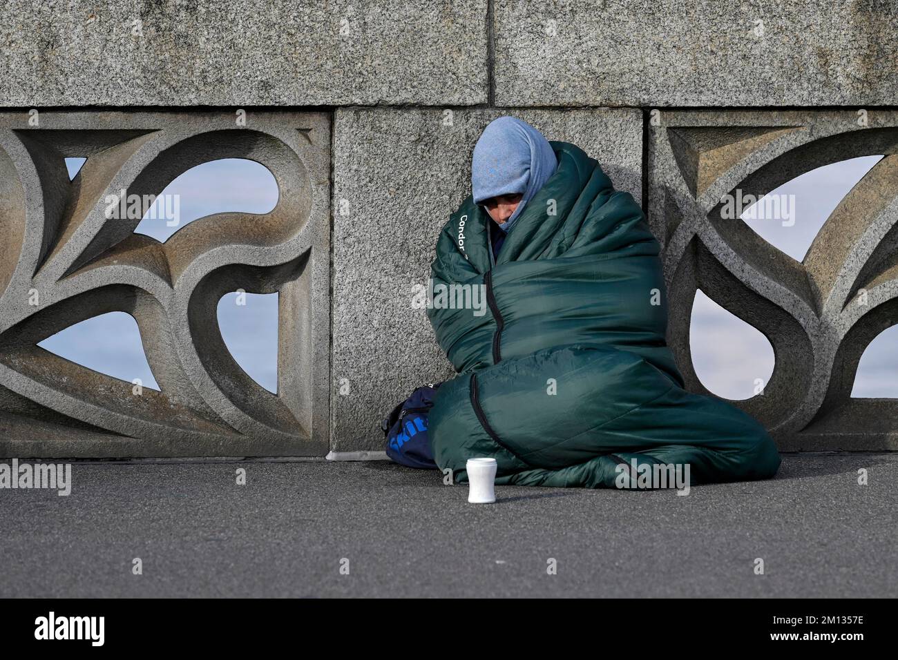 Homeless with sleeping bag hi-res stock photography and images - Alamy