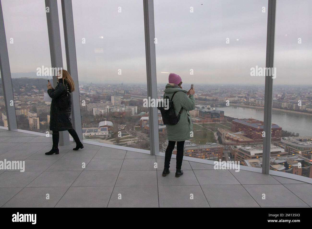 Budapest, Hungary. 8th Dec, 2022. Visitors take photos from the MOL ...