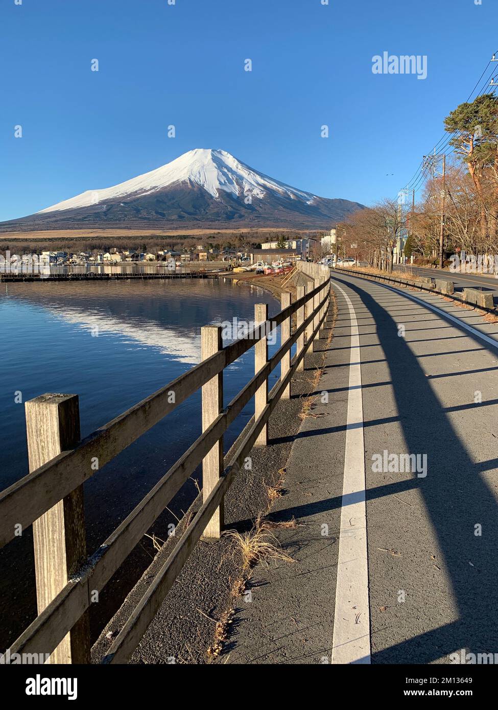 Mount Fuji in the backdrop with a road leading to it and with a clear ...
