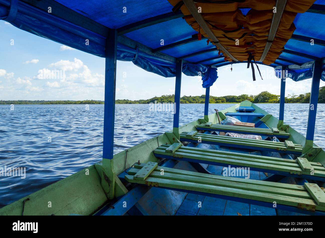Boat trip along the Amazon river inside the rain forest in Manaus ...