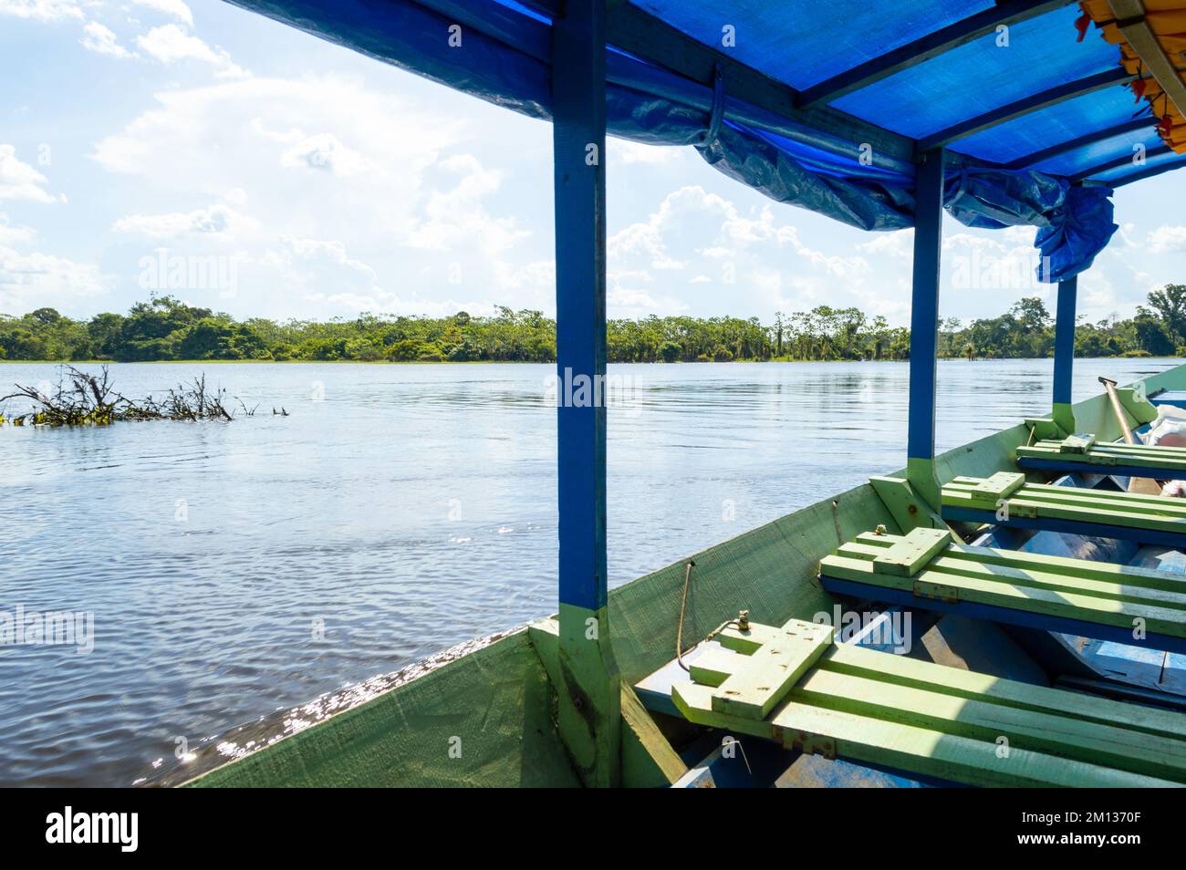 Boat trip along the Amazon river inside the rain forest in Manaus ...