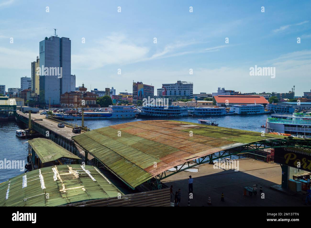 View of the main port of Manaus with many boats and ferry Stock Photo ...