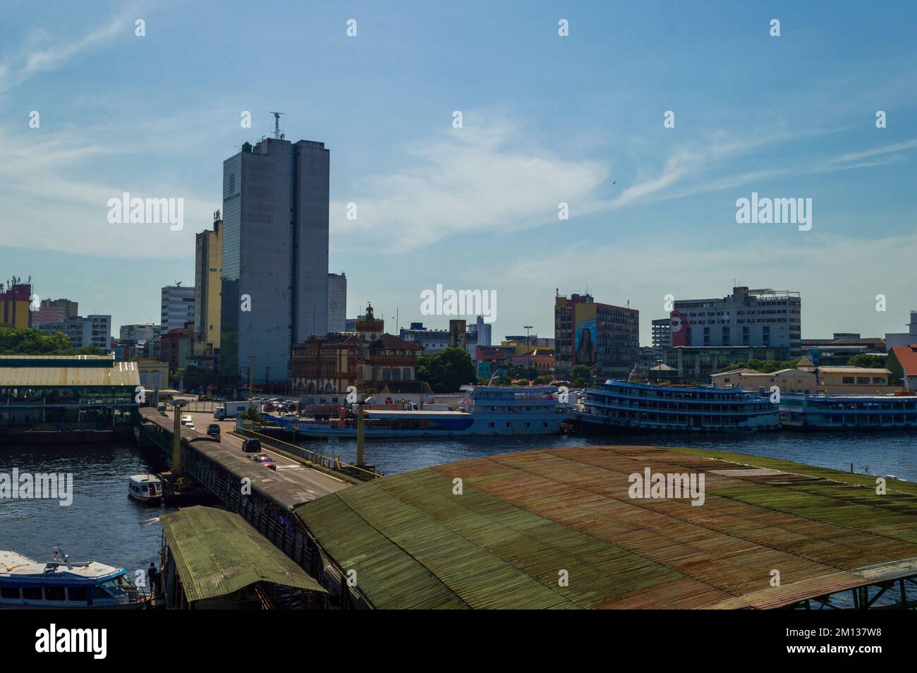 View of the main port of Manaus with many boats and ferry Stock Photo ...