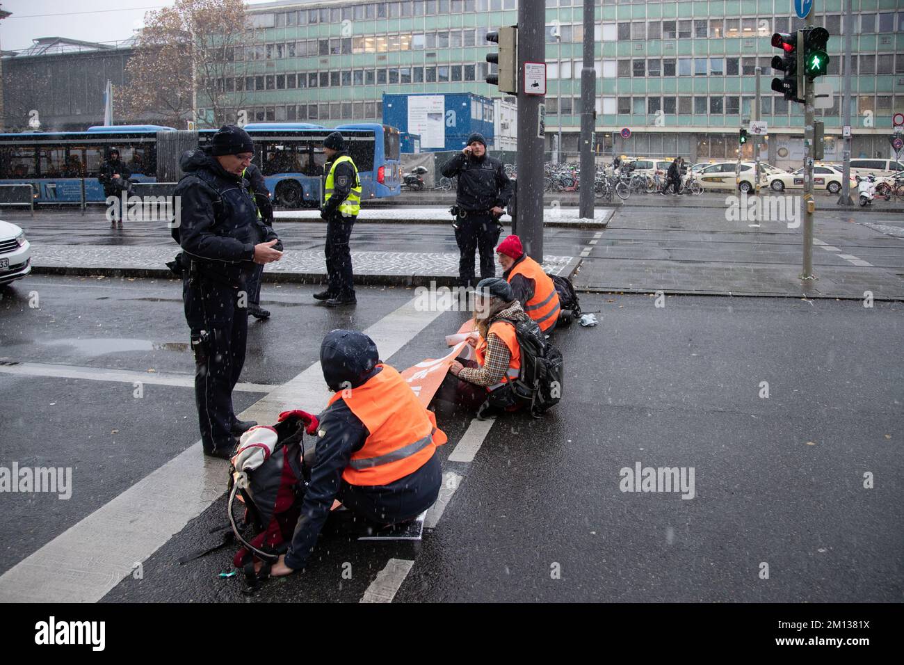 Munich, Germany. 09th Dec, 2022. Three activists of the Last Generation ...
