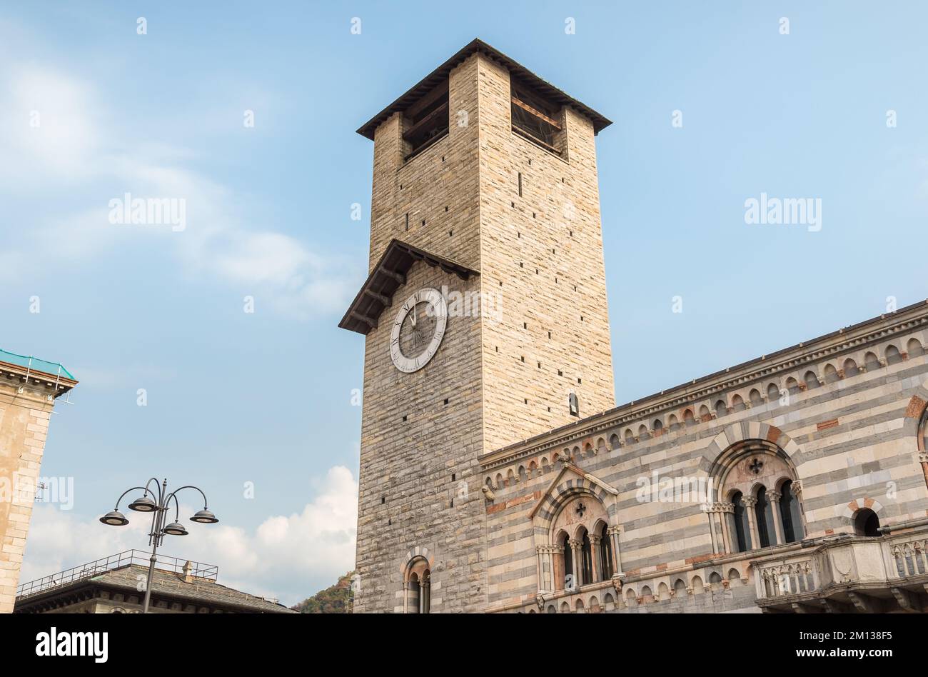 The civic tower with clock of the Como Cathedral in historic center of ...