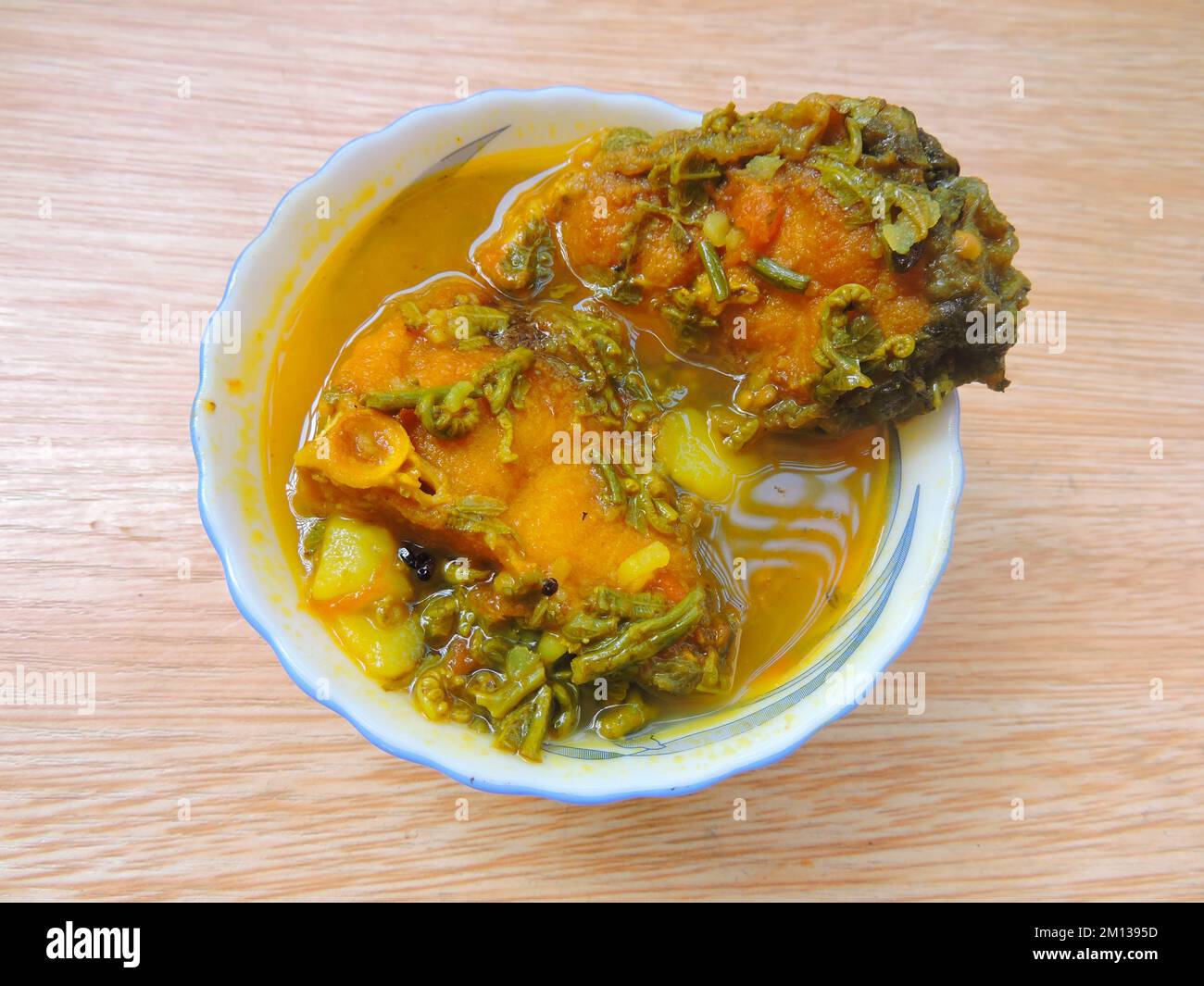Famous Assamese recipe called Machor Tenga in Assam. This is a very ...